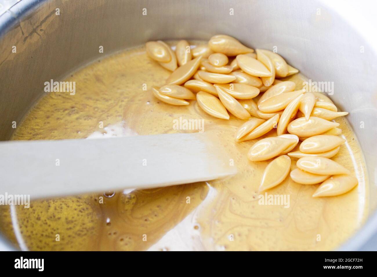 Waxing granules hi-res stock photography and images - Alamy