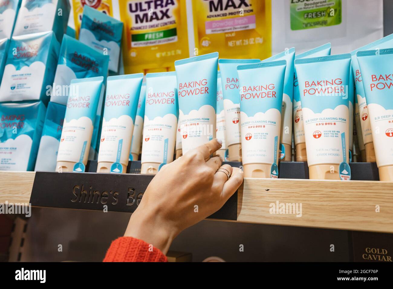 26 February 2021, UAE, Dubai: A female customer chooses Korean ...