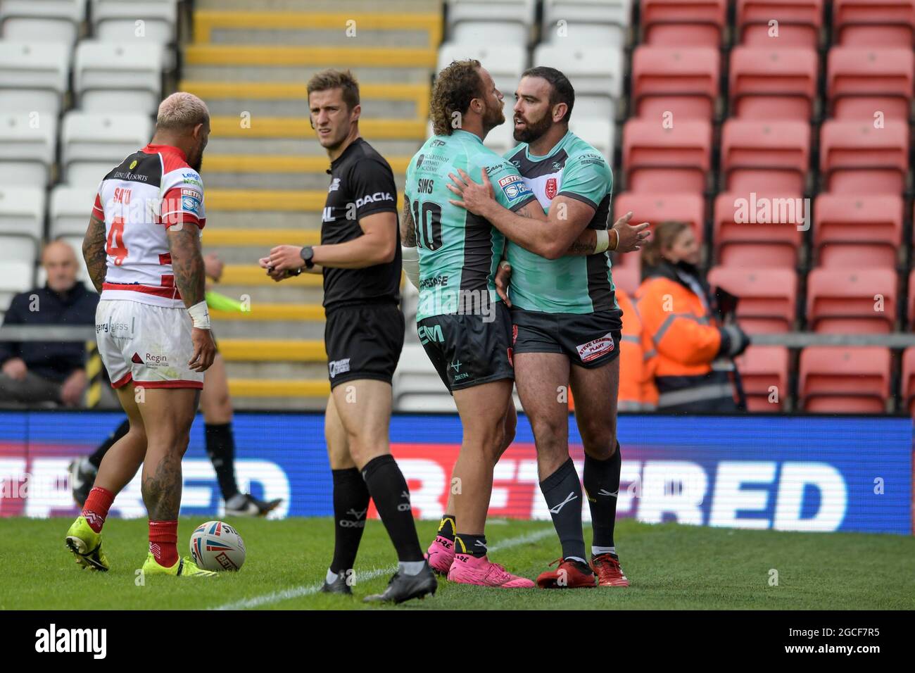Kane Linnett (12) of Hull KR celebrates scoring a try with Korbin Sims ...
