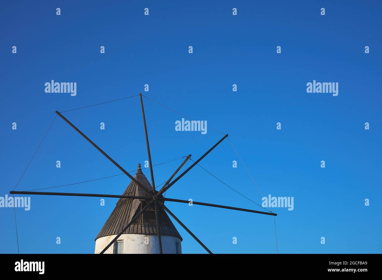 detail of an old windmill with blades over blue sky Stock Photo - Alamy