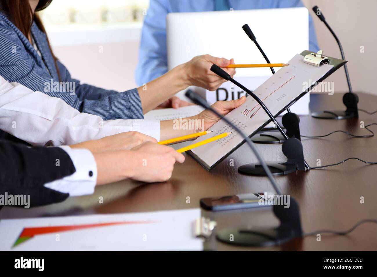 Conference meeting with microphones Stock Photo - Alamy