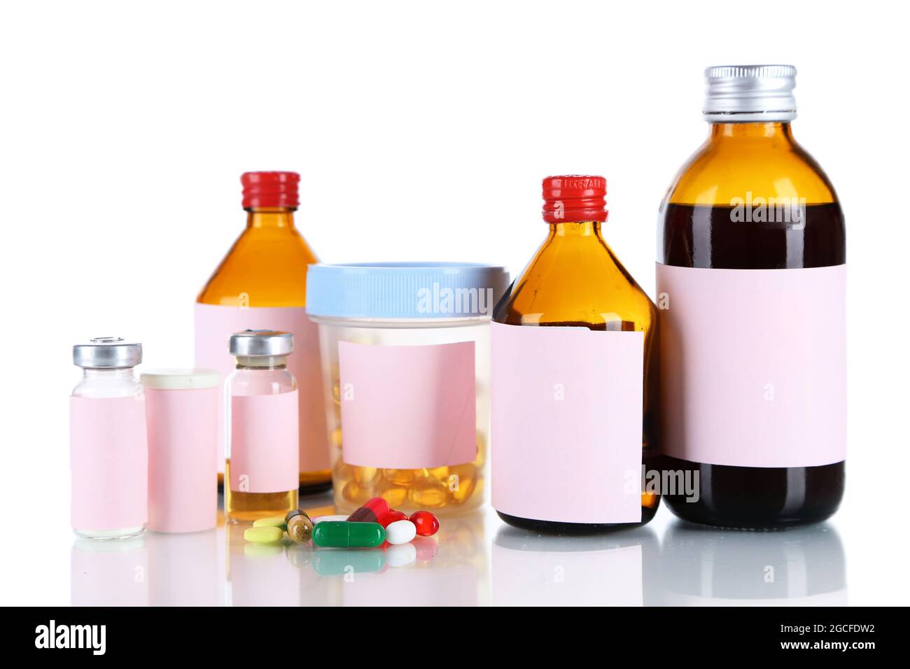 Pills and medicine bottles isolated on white Stock Photo - Alamy