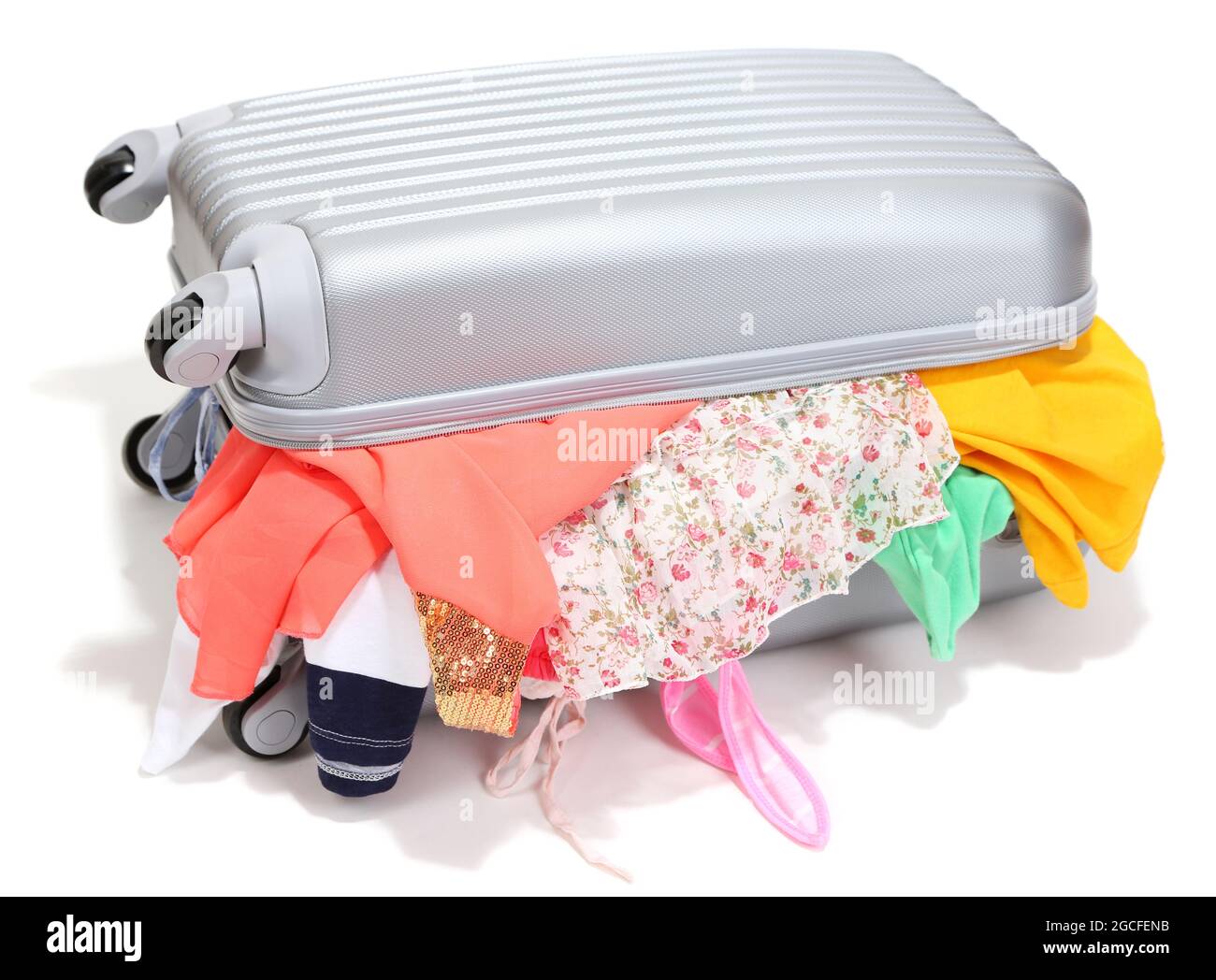 Suitcase with no neatly folded things isolated on white Stock Photo - Alamy