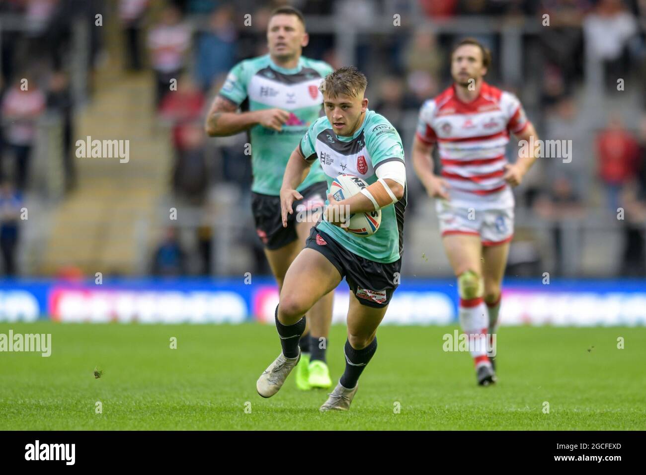 Mikey Lewis (20) of Hull KR runs forward with the ball Stock Photo - Alamy
