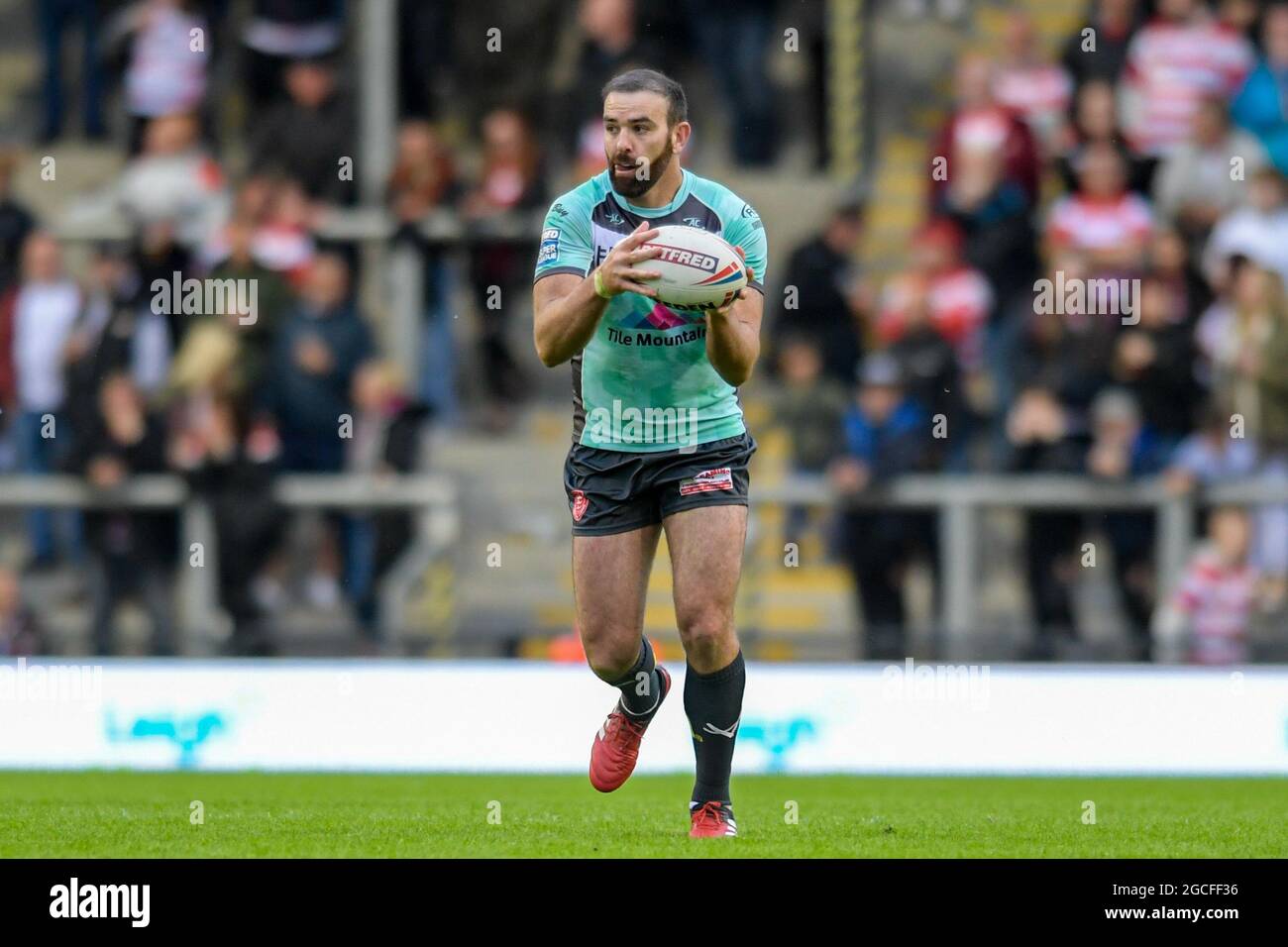 Leigh, UK. 08th Aug, 2021. Kane Linnett (12) of Hull KR with the ball ...
