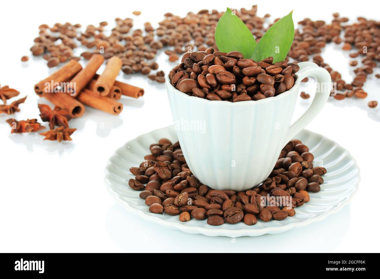 Coffee beans in cup isolated on white Stock Photo - Alamy