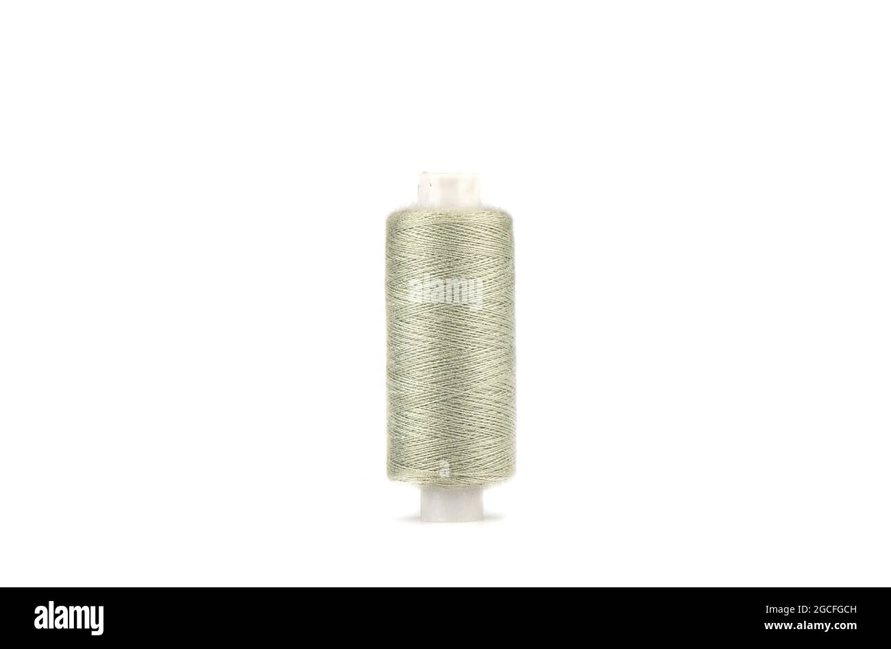 Spool of thread in black squeeze color isolated on white background ...
