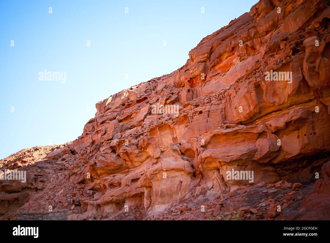 the gorge of the red mountain canyon which is located in the desert ...