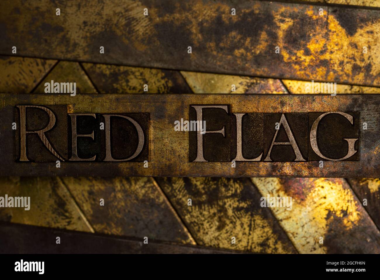 Red Flag text on vintage textured silver grunge copper and gold ...