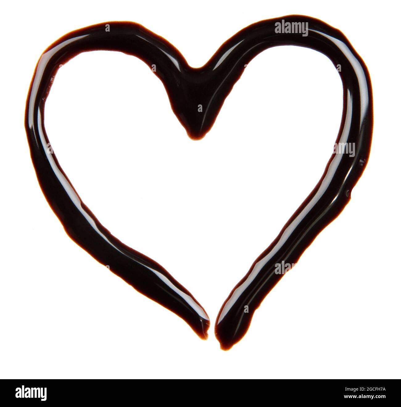Heart made from chocolate syrup, isolated on white Stock Photo - Alamy