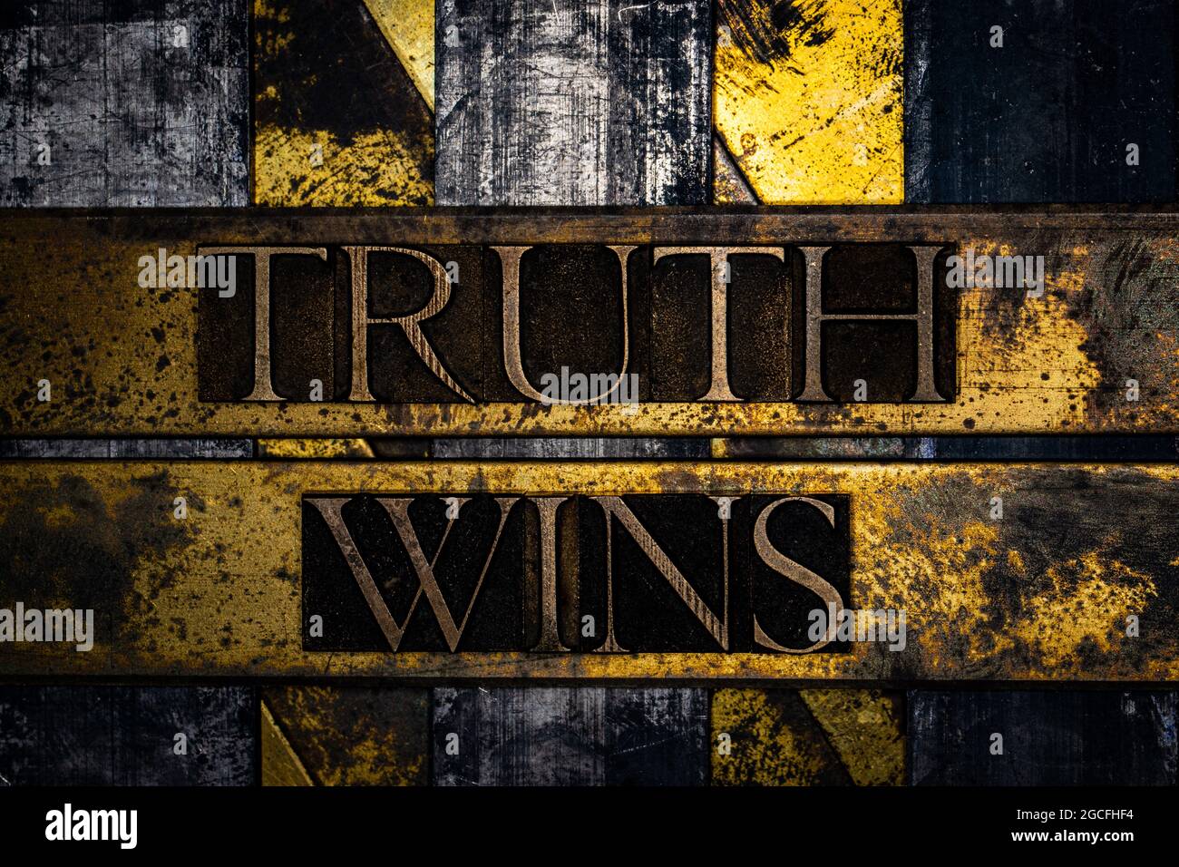 Truth Wins text on vintage textured grunge copper and gold background ...
