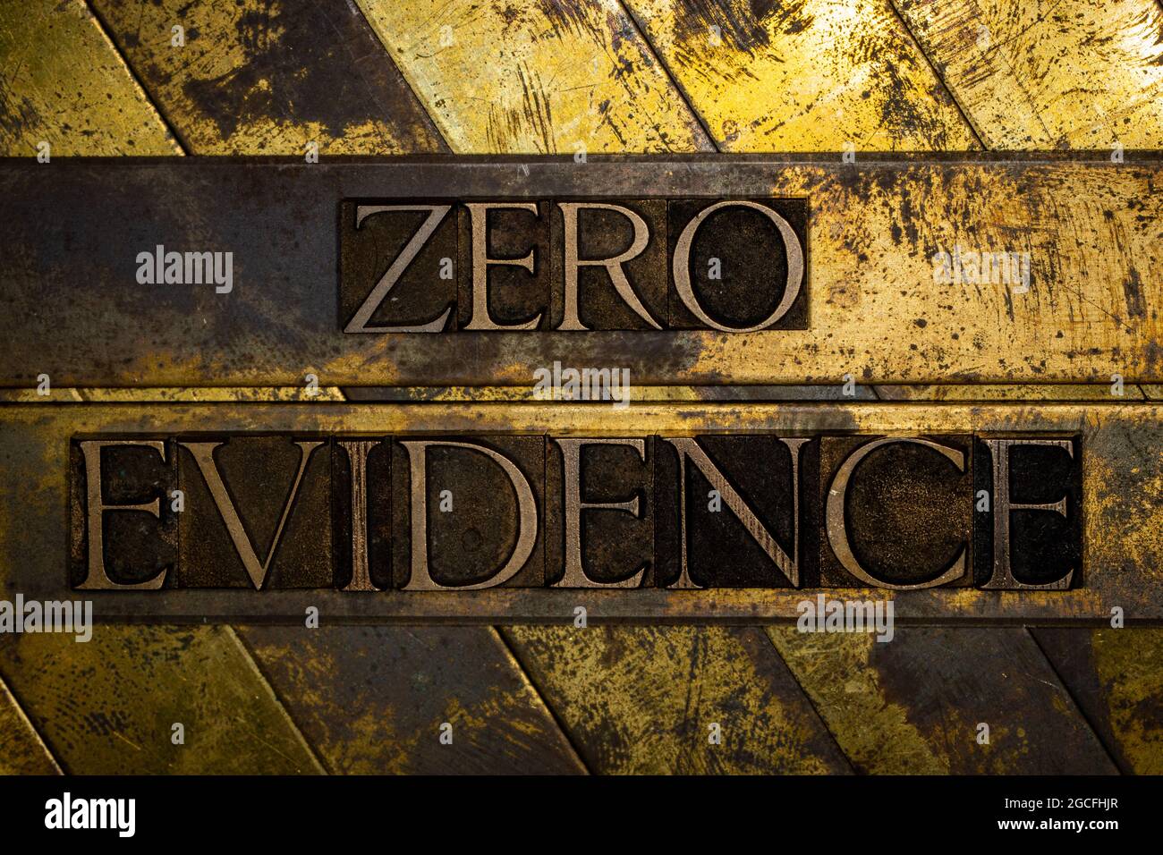 Zero Evidence text message on textured grunge copper and vintage gold ...