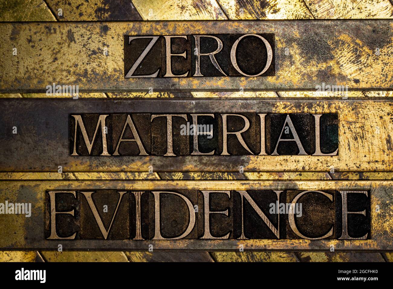 Zero Material Evidence text message on textured grunge copper and vintage gold background Stock ...