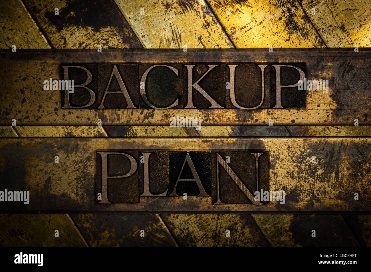 Backup Plan text on vintage textured copper and gold background Stock ...