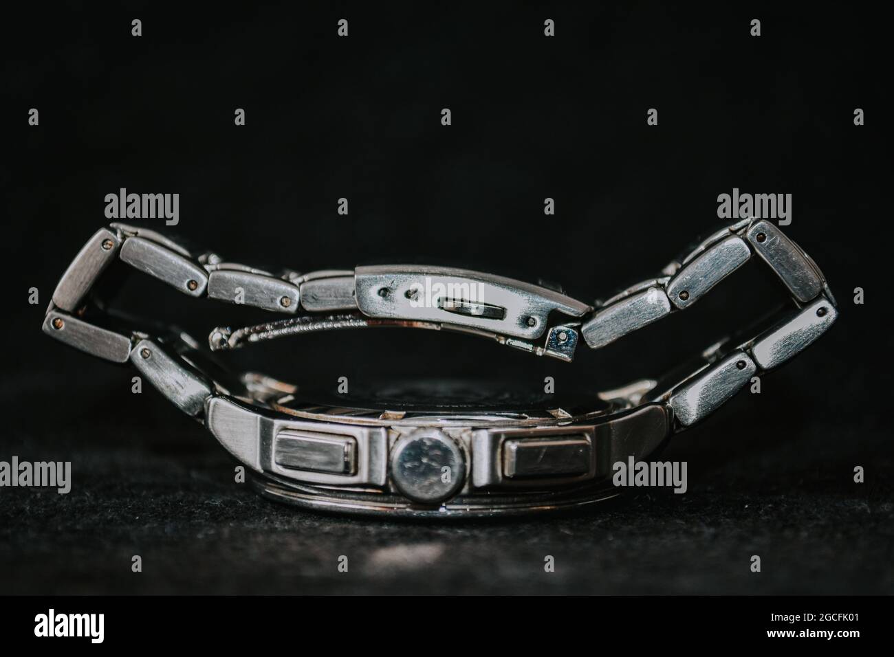 A watch on a black background Stock Photo - Alamy