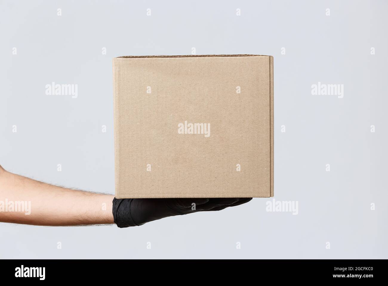 Contactless delivering, covid-19 and shopping concept. Image of courier ...