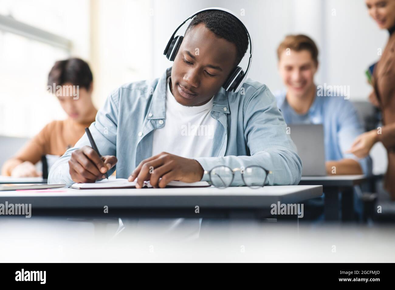 Exam hall black student hi-res stock photography and images - Alamy