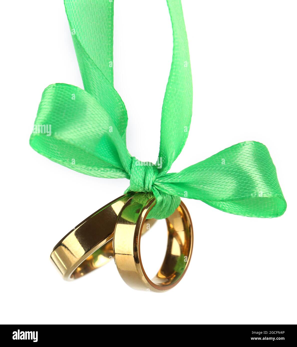 Wedding rings tied with ribbon isolated on white Stock Photo - Alamy