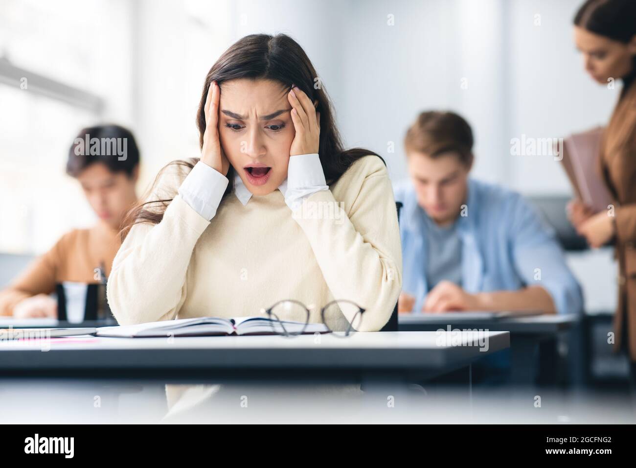 Confused student in class hi-res stock photography and images - Alamy