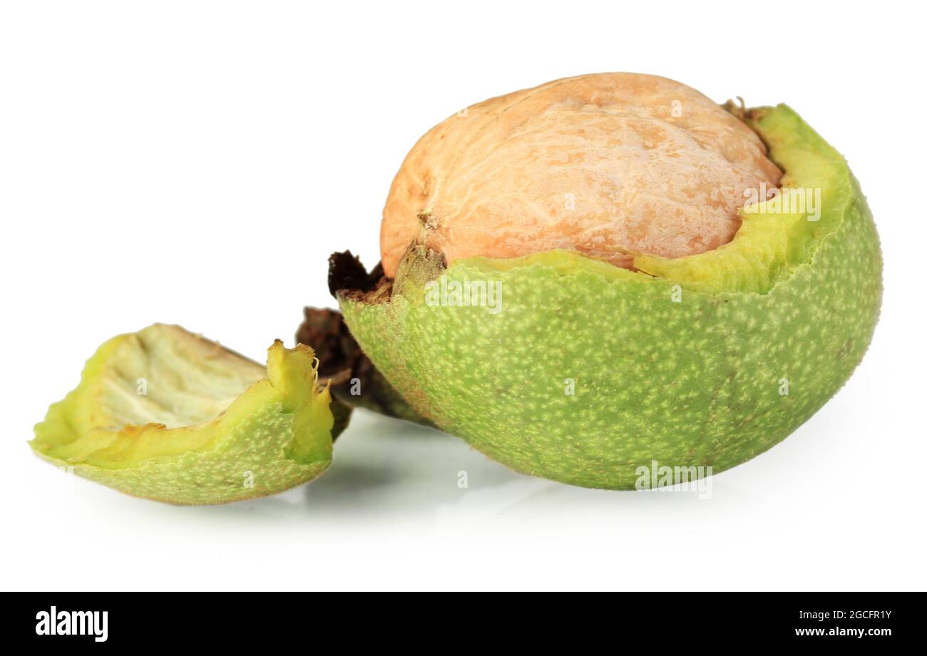 Broken walnut isolated on white Stock Photo - Alamy