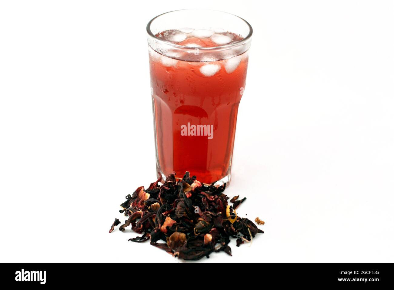 Fresh refrigerated Roselle juice glass with dried Roselle herbs ...