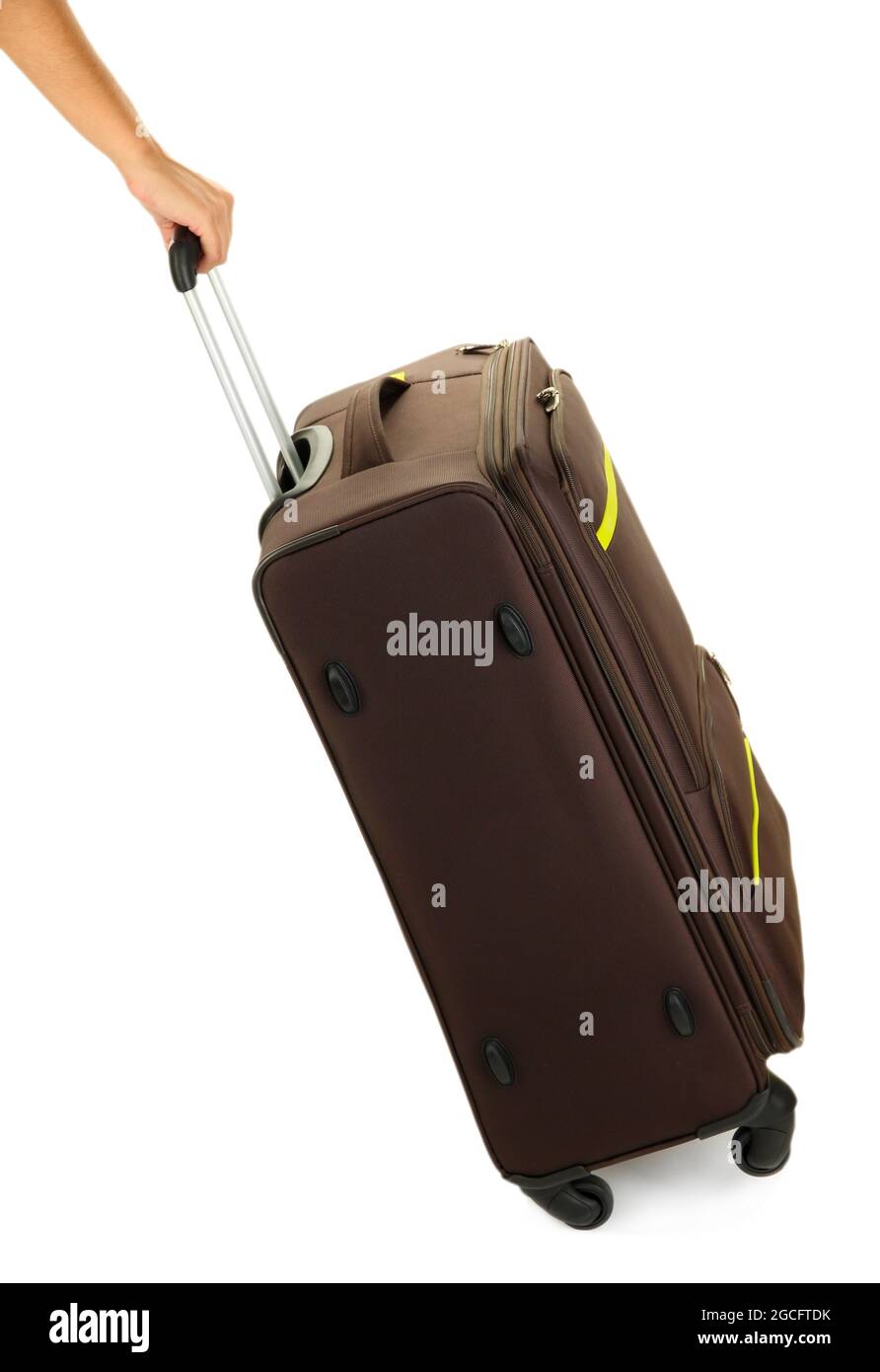 Suitcase in hand isolated on white Stock Photo - Alamy