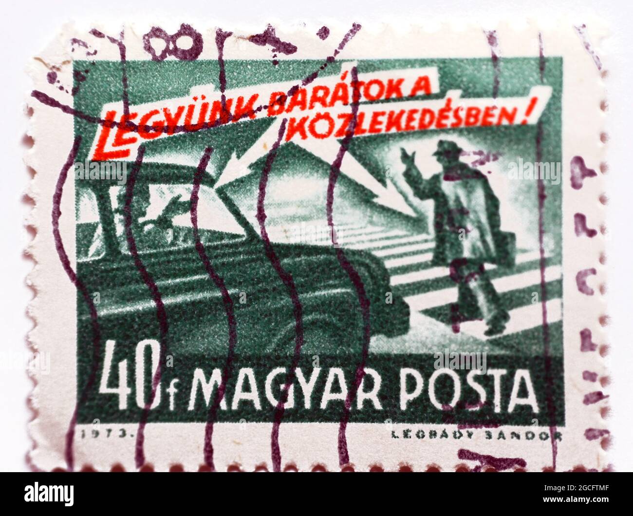 A stamp printed in HUNGARY showing image of a car driver stopping at ...