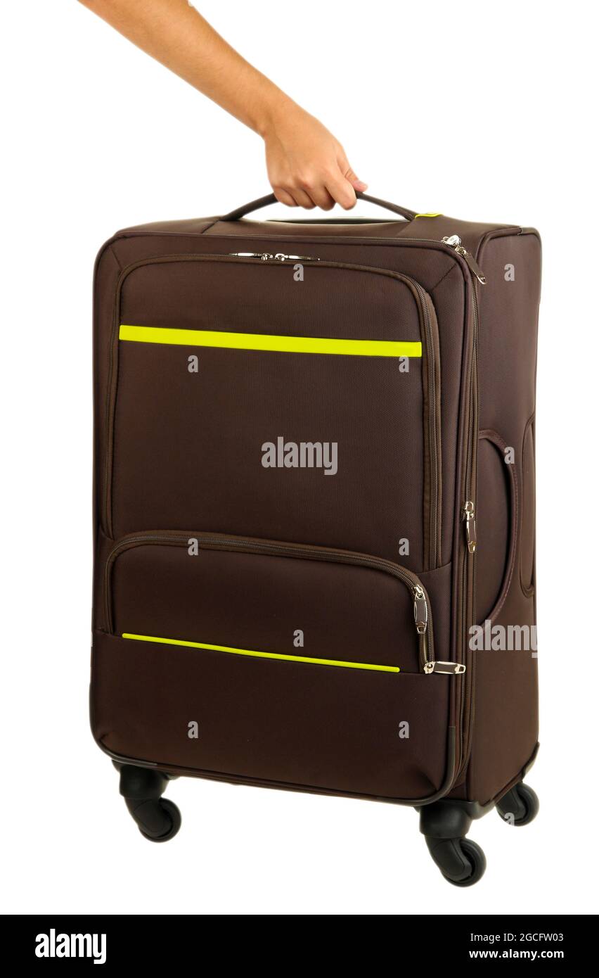 Suitcase in hand isolated on white Stock Photo - Alamy