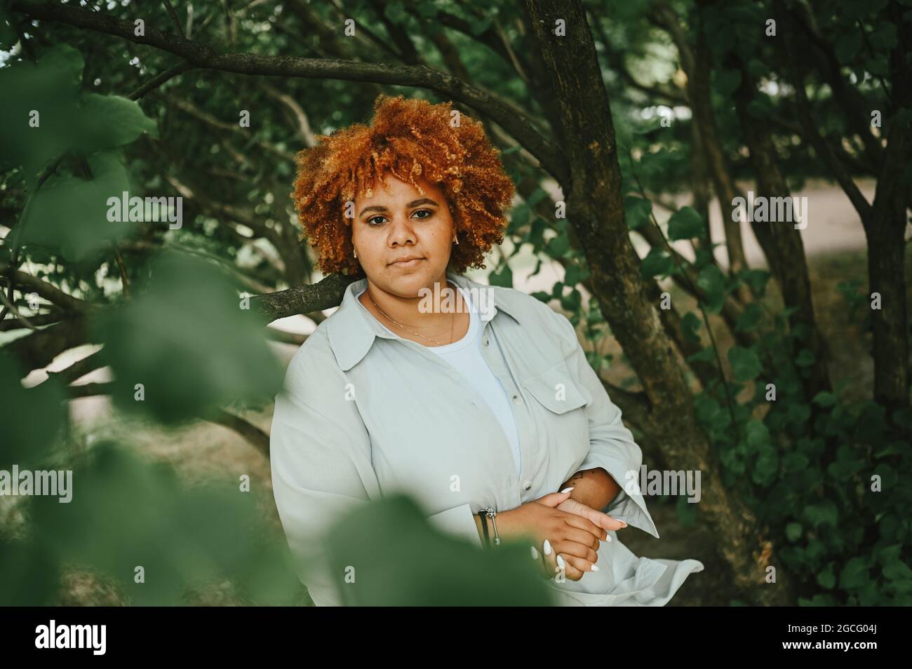 Fashion portrait of young naturally beautiful plus size African ...