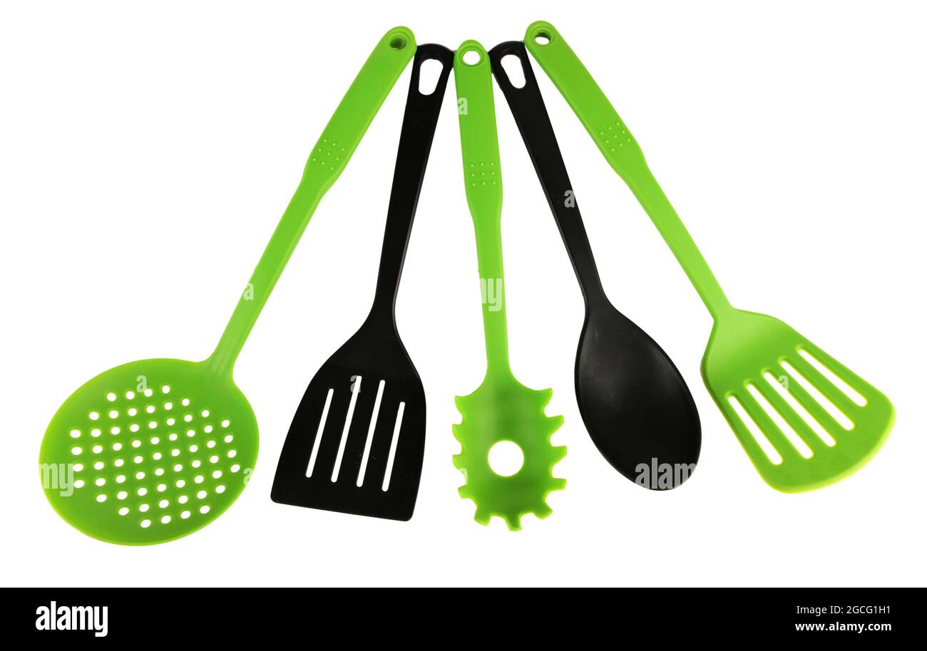 Plastic kitchen utensils isolated on white Stock Photo - Alamy