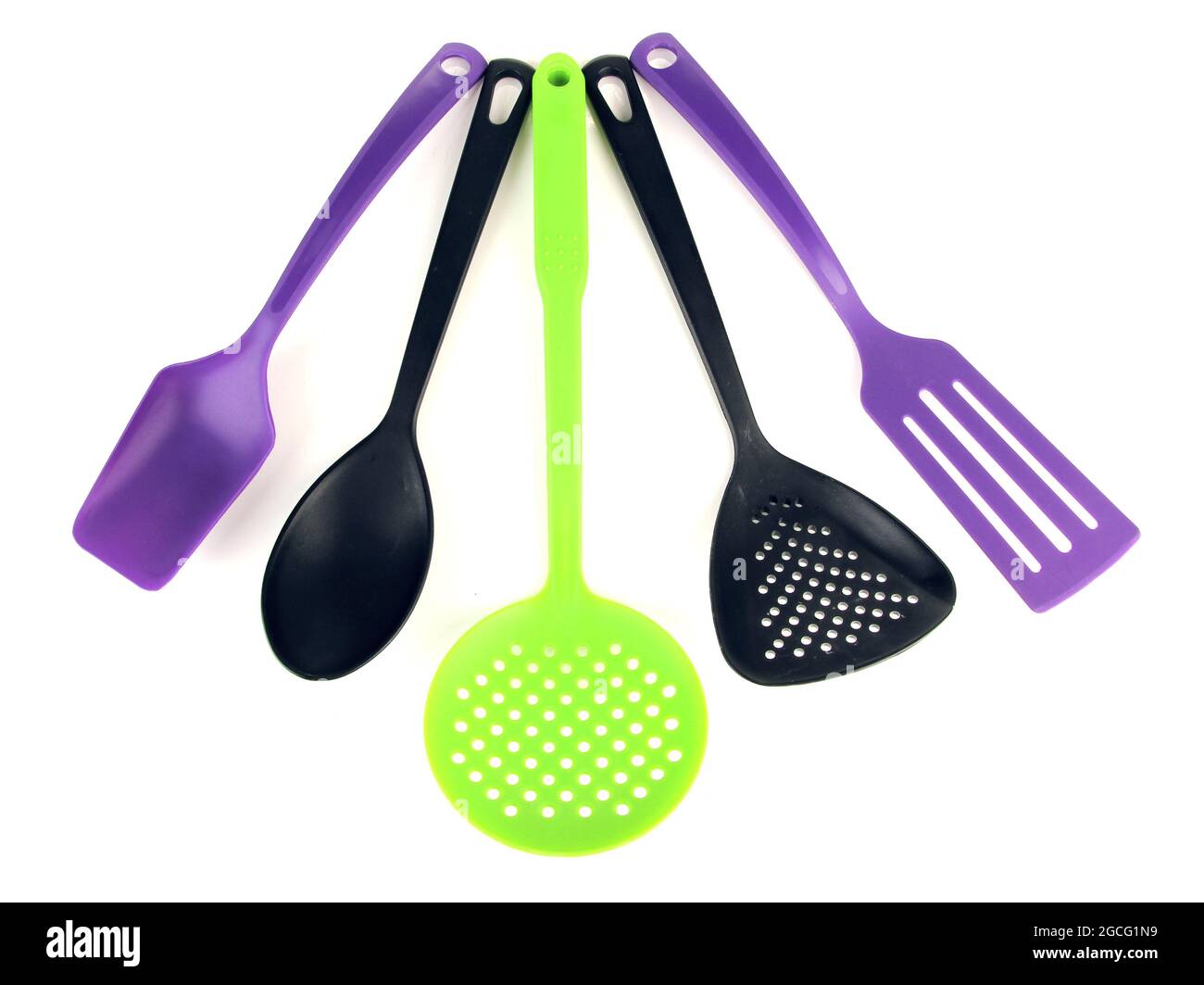 Plastic kitchen utensils isolated on white Stock Photo - Alamy