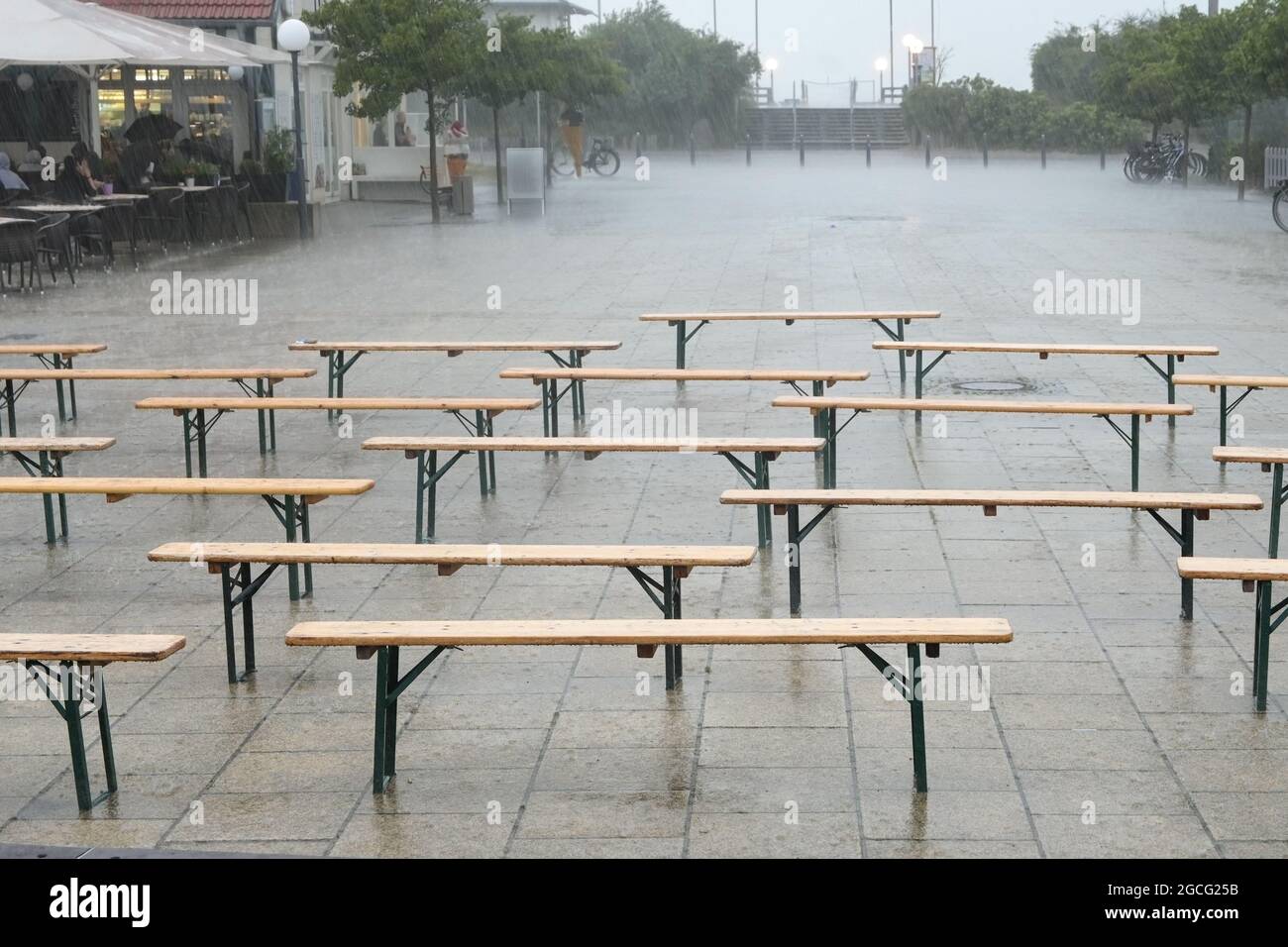 Wet weather during summer vacations, empty benches in the rain cause ...