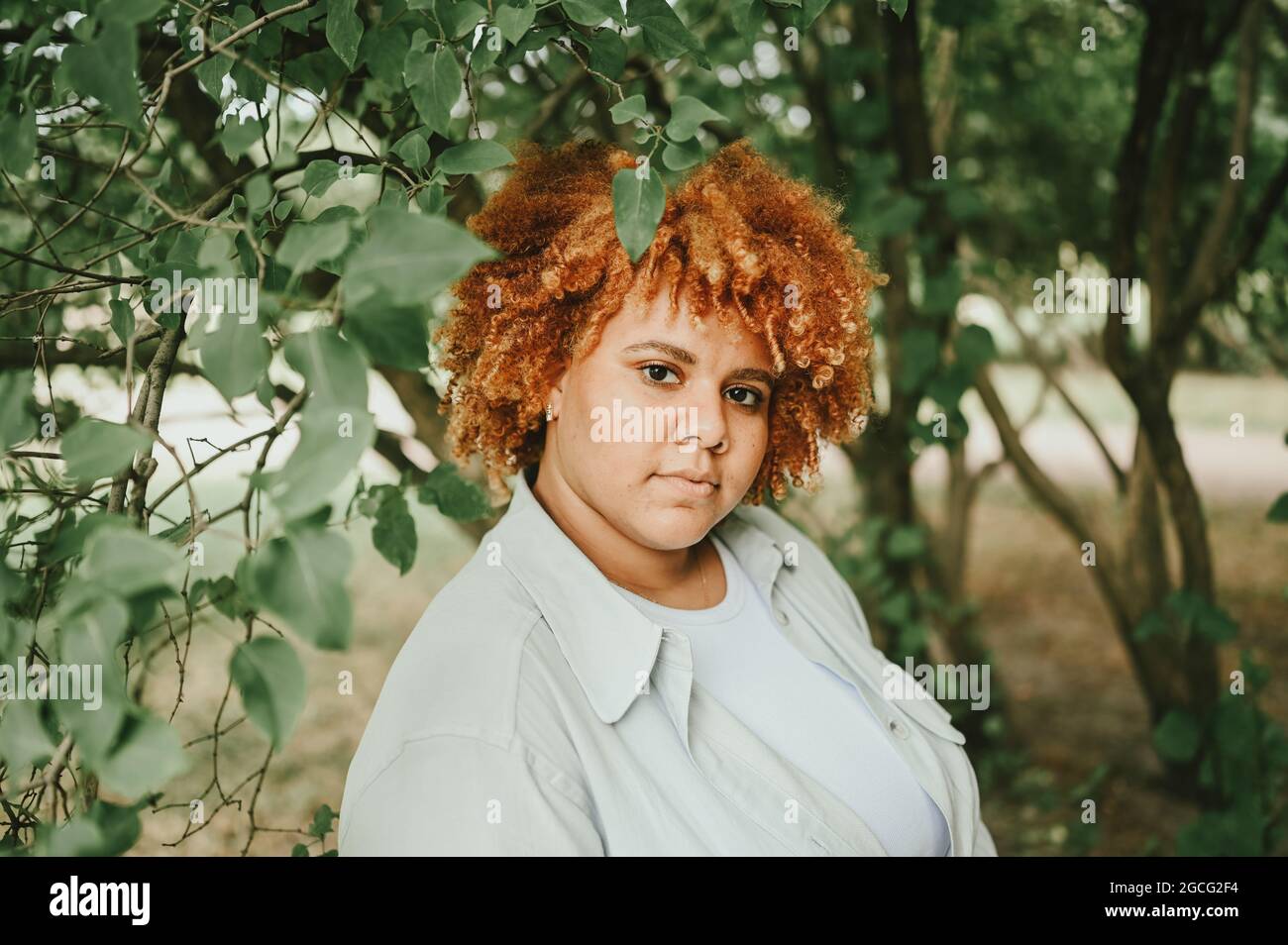 Fashion portrait of young naturally beautiful plus size African ...