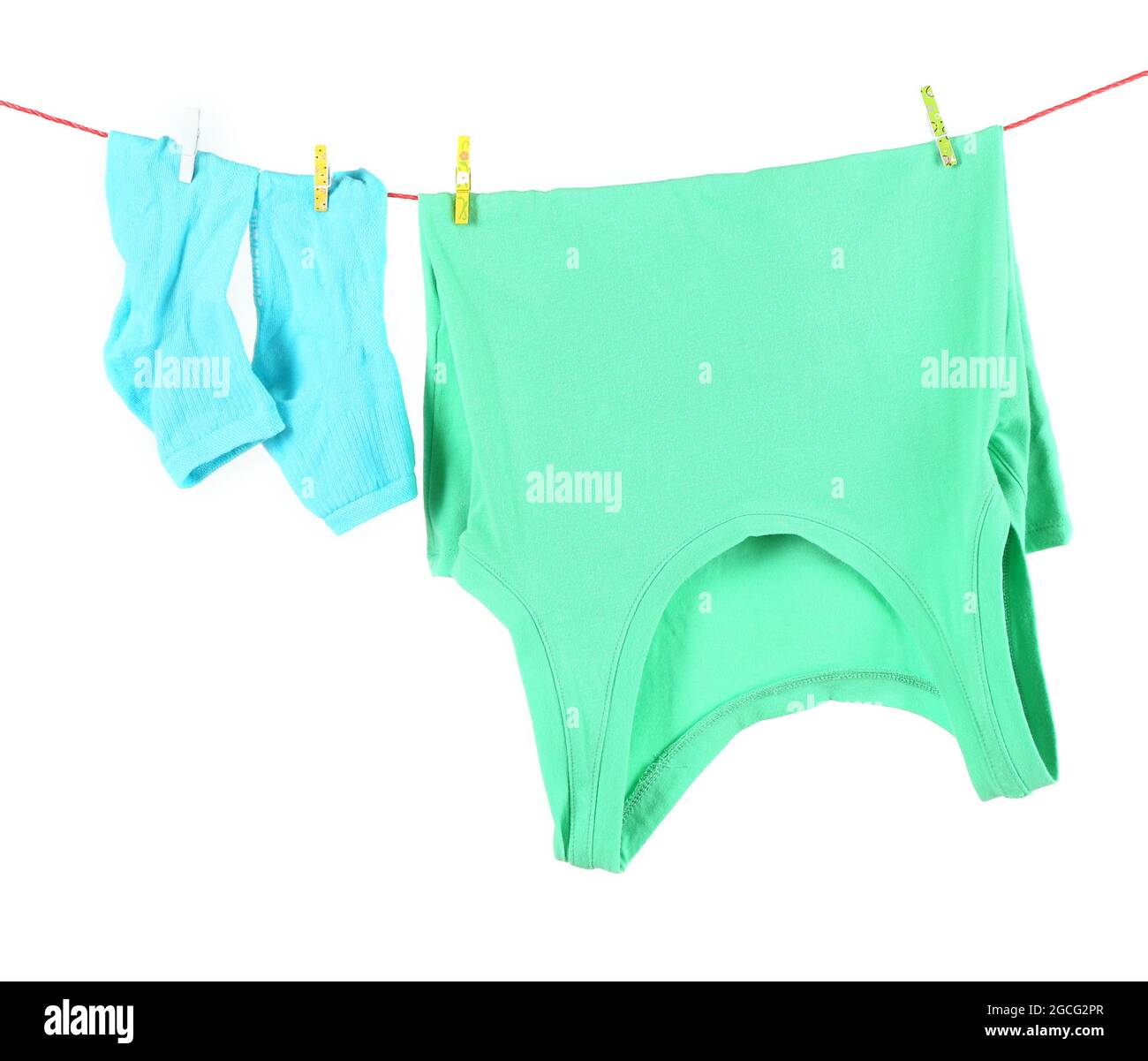 Clothes on rope isolated on white Stock Photo - Alamy