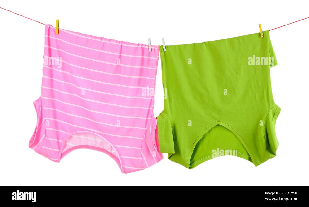 Clothes on rope isolated on white Stock Photo - Alamy