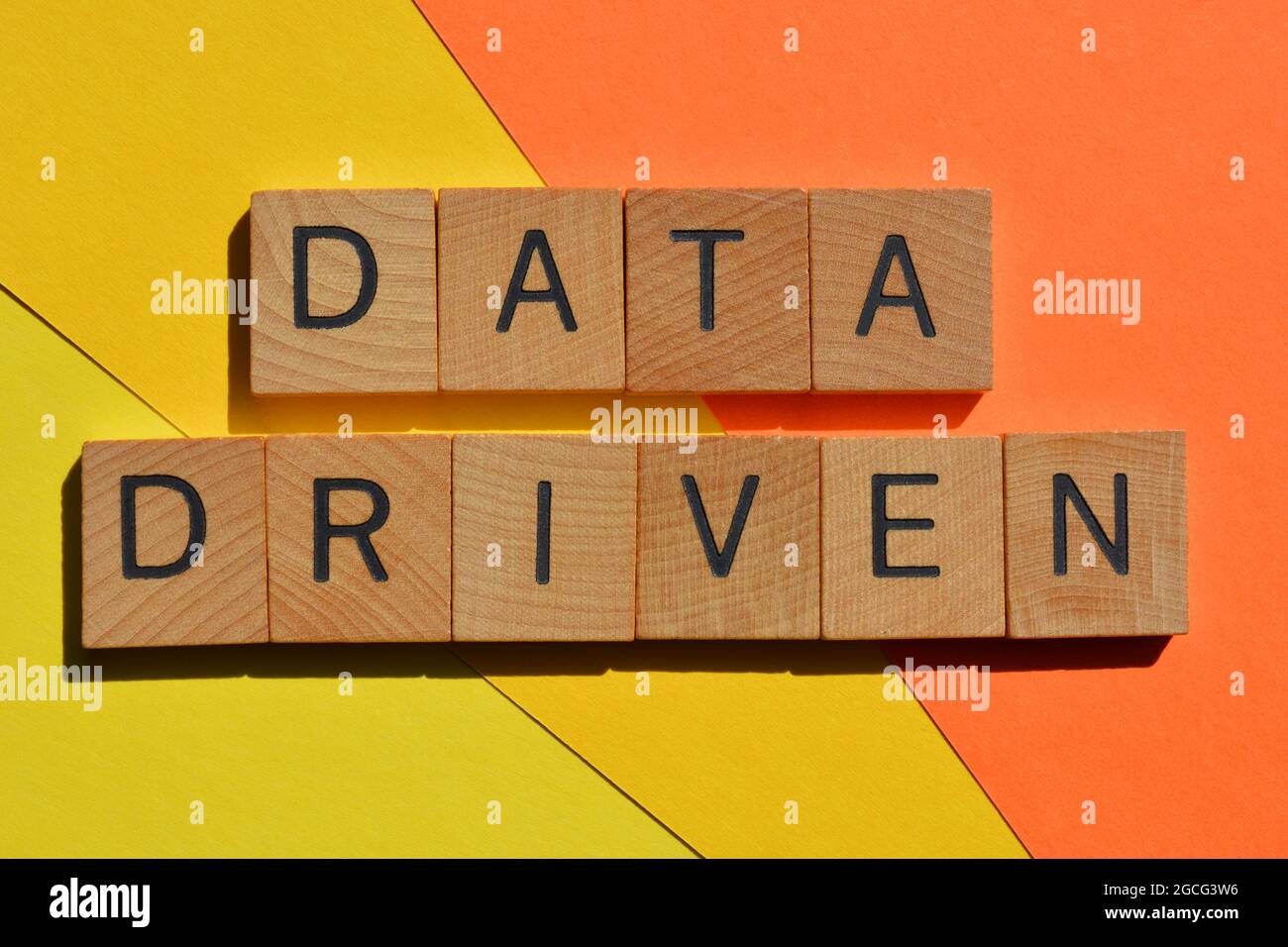 Data Driven, phrase in wooden alphabet letters isolated on bright ...