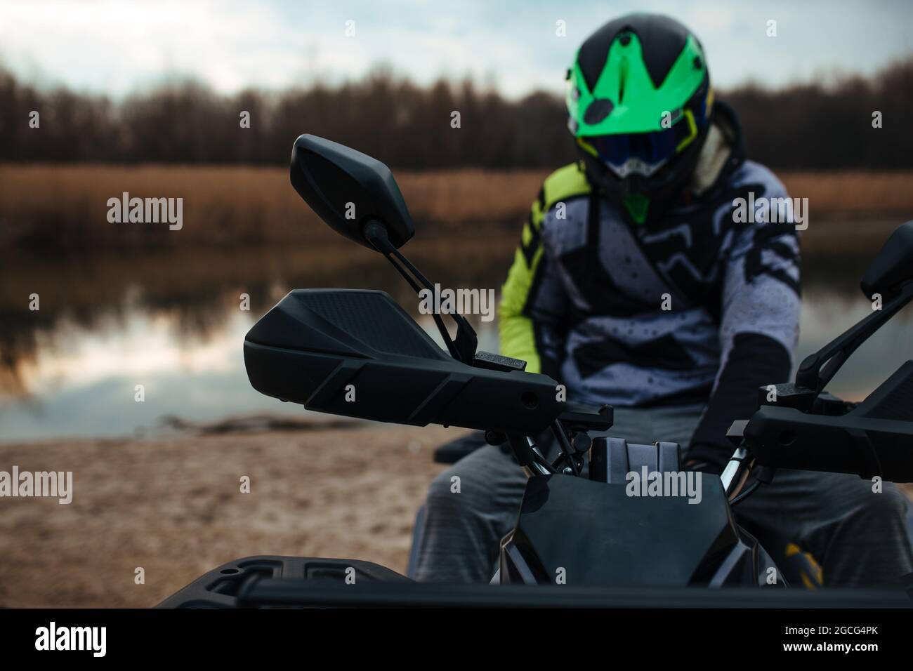 Driver sits on quad hi-res stock photography and images - Alamy
