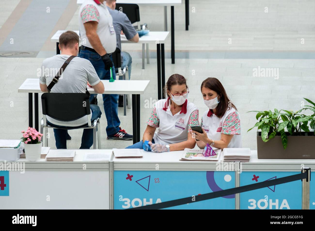 Moscow. Russia. 01 August 2021. Administrators in uniforms and face ...