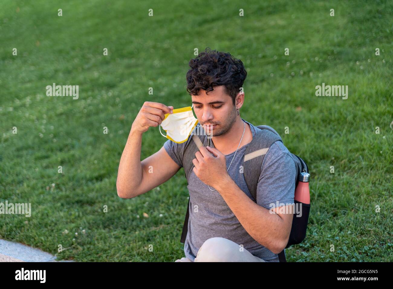 Taking off the mask hi-res stock photography and images - Alamy