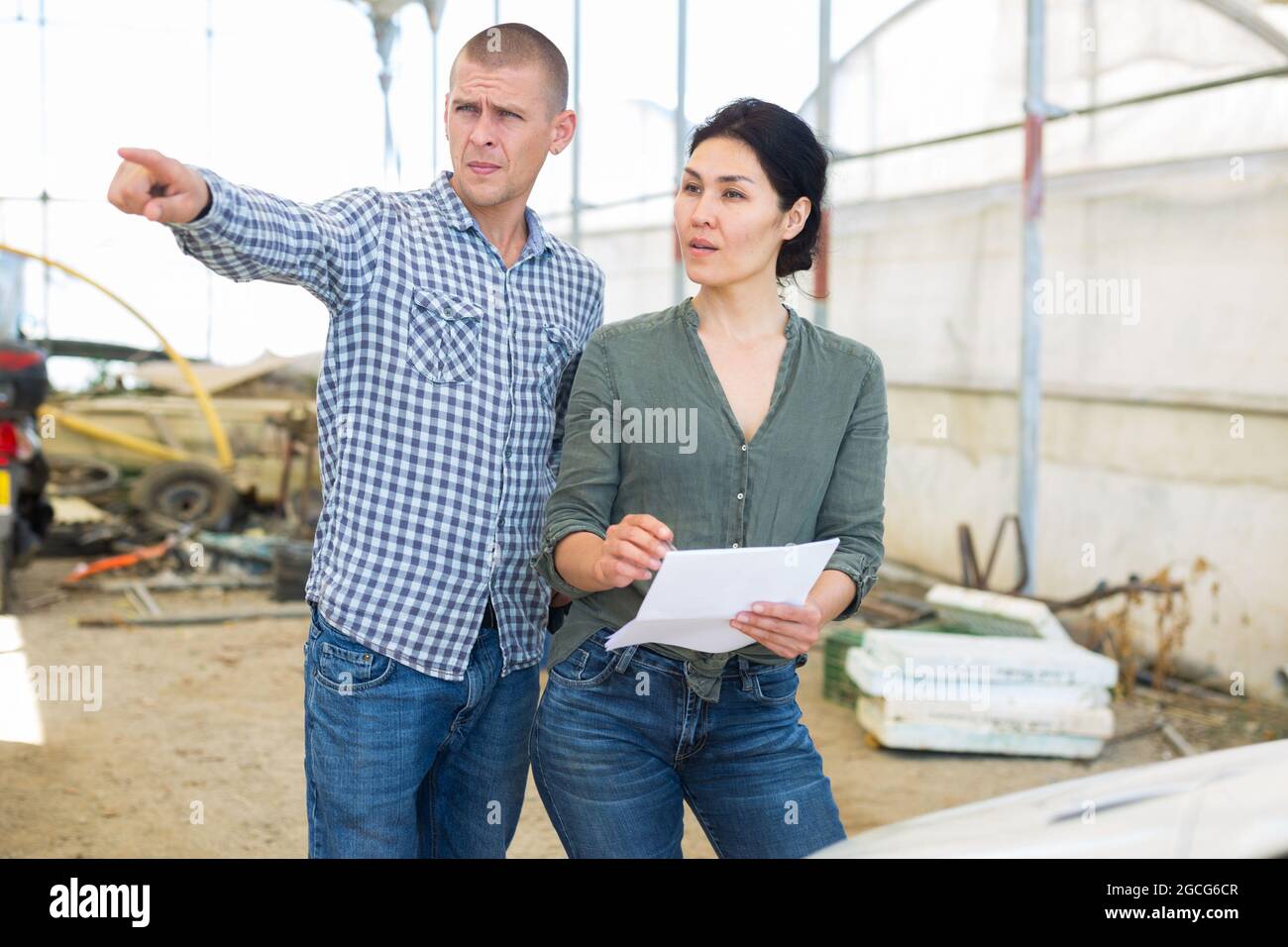 Two people with documents Stock Photo - Alamy