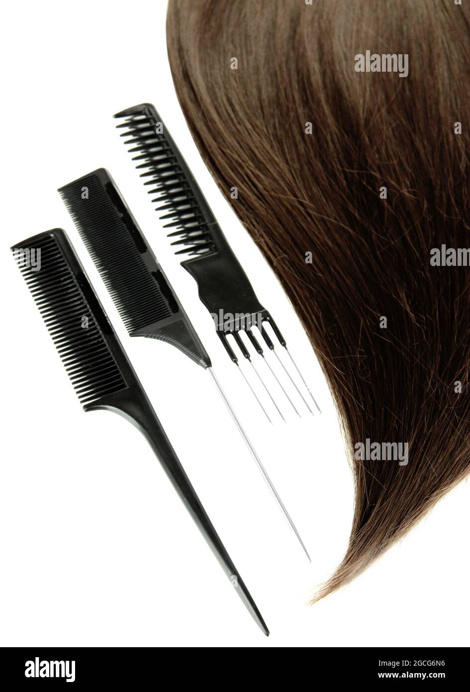 Shiny brown hair with combs isolated on white Stock Photo - Alamy