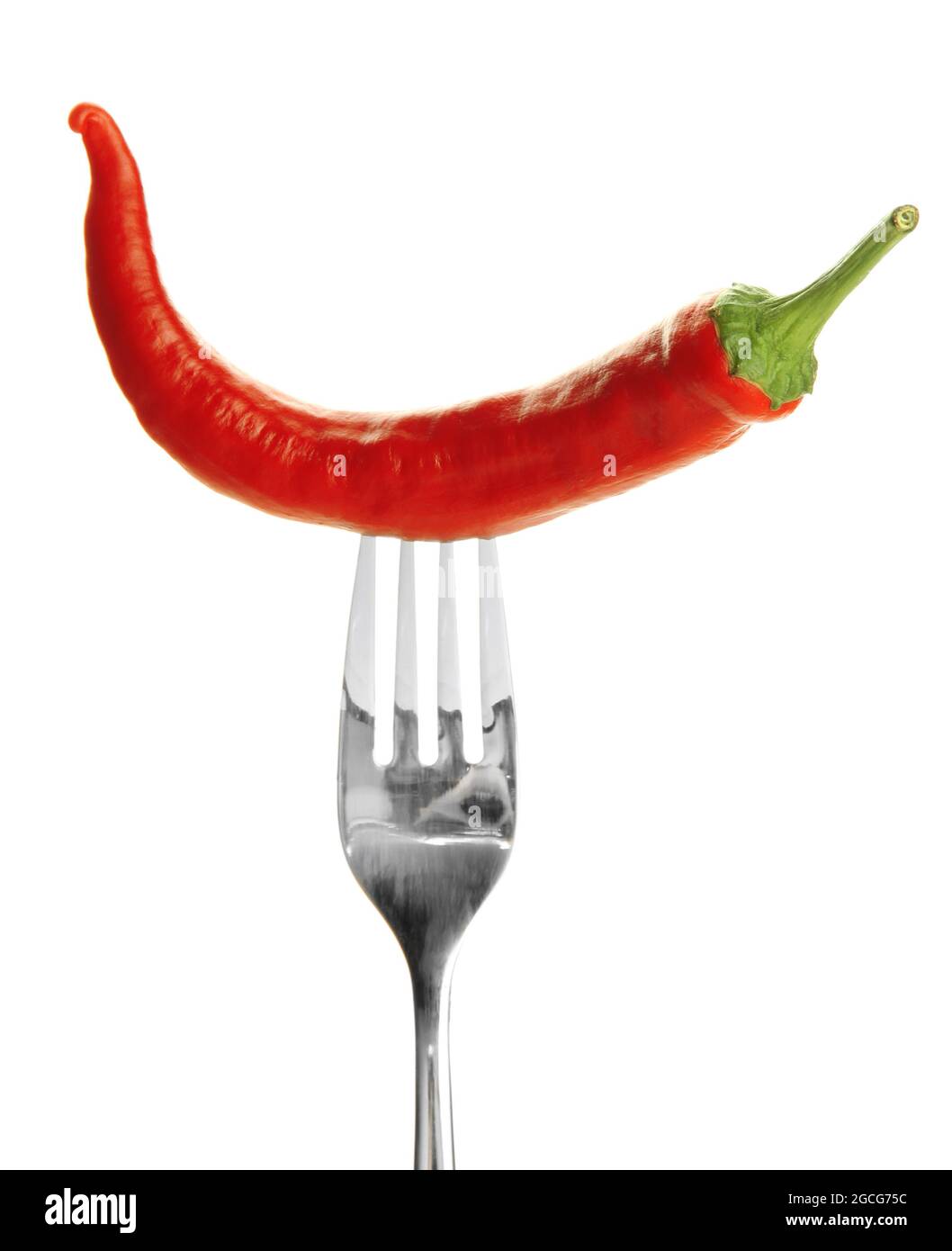 Red hot chili pepper on fork, isolated on white Stock Photo - Alamy