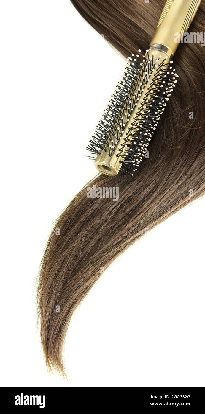 Shiny brown hair with comb isolated on white Stock Photo - Alamy