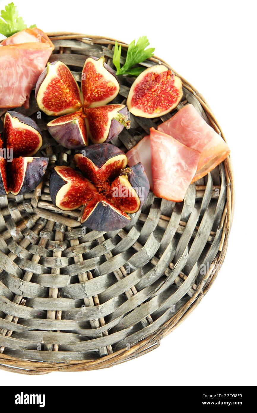 Tasty figs with ham, isolated on white Stock Photo - Alamy