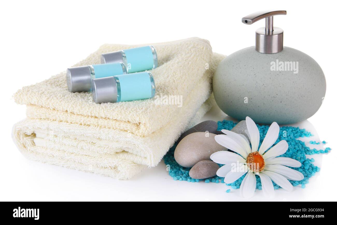 Beautiful spa setting with flower isolated on white Stock Photo - Alamy