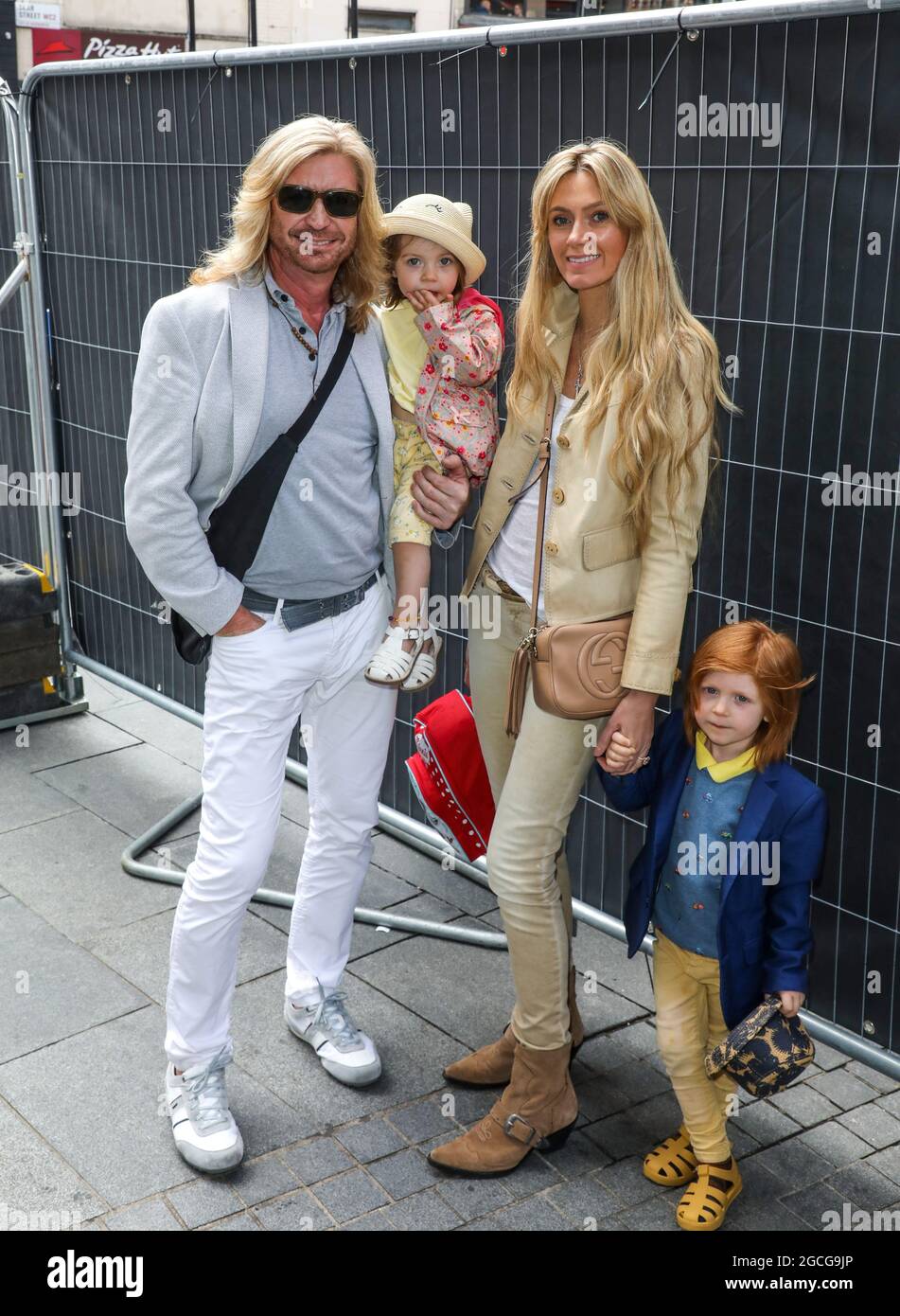 Nicky Clarke and Kelly Simpkin seen with kids attending the premiere of ...