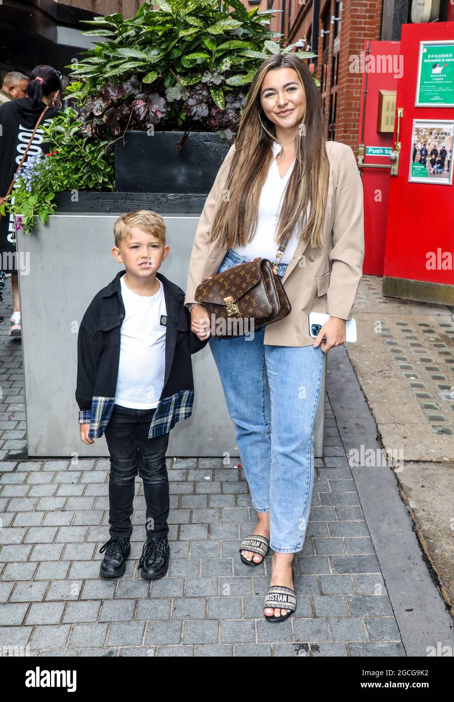 Chloe Patton seen with a kid attending the premiere of Paw Patrol The ...
