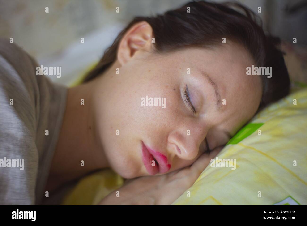A shallow focus of a young Russian woman sleeping in a bed Stock Photo ...