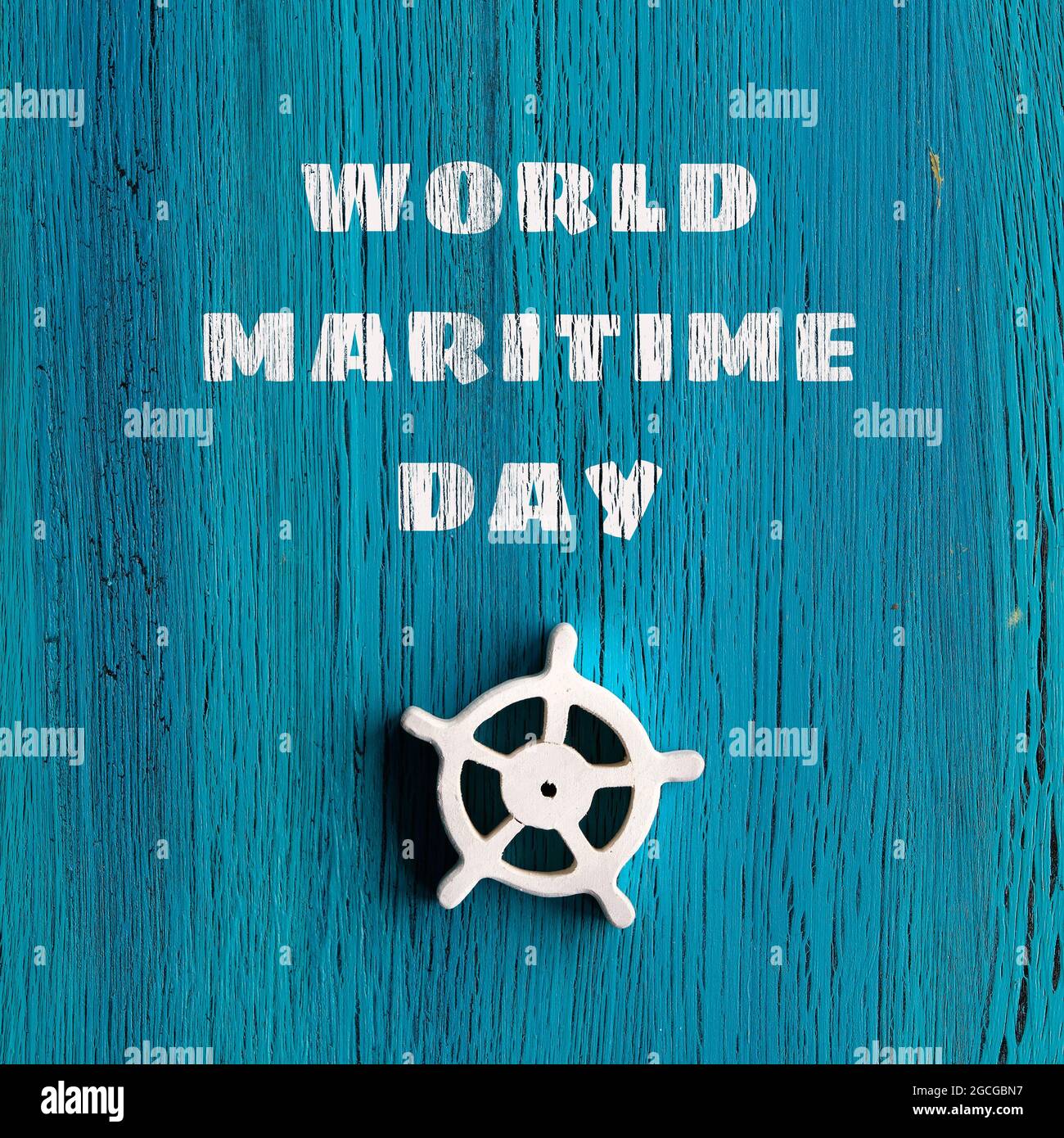 World Maritime Day text on grungy blue turquoise wooden background ...