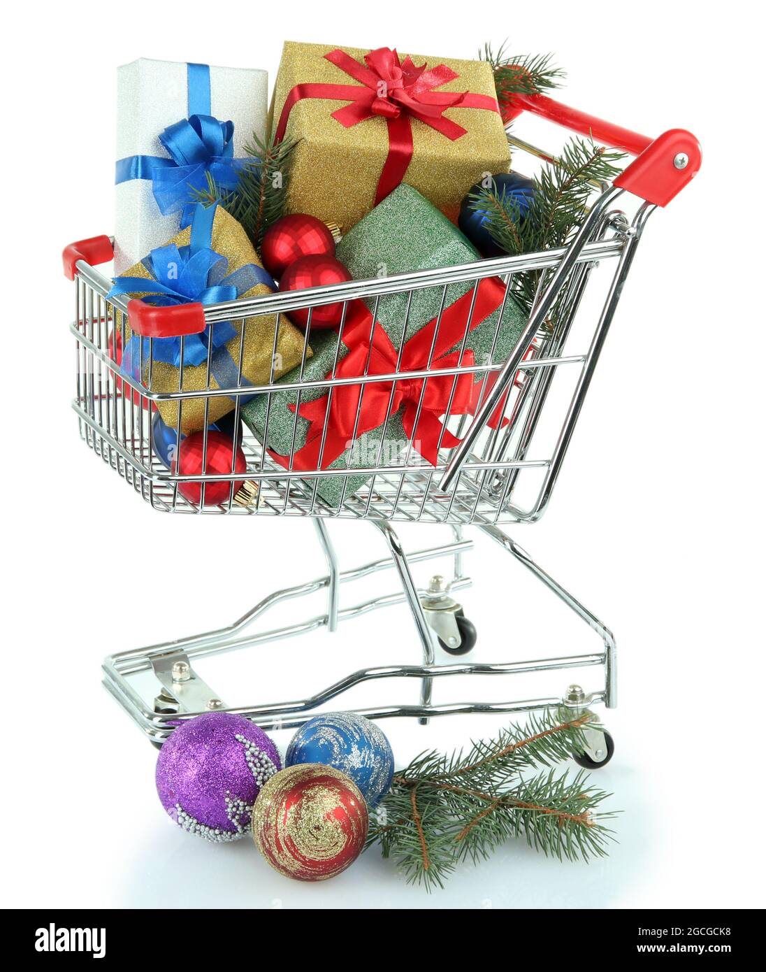Christmas gifts in shopping trolley, isolated on white Stock Photo - Alamy